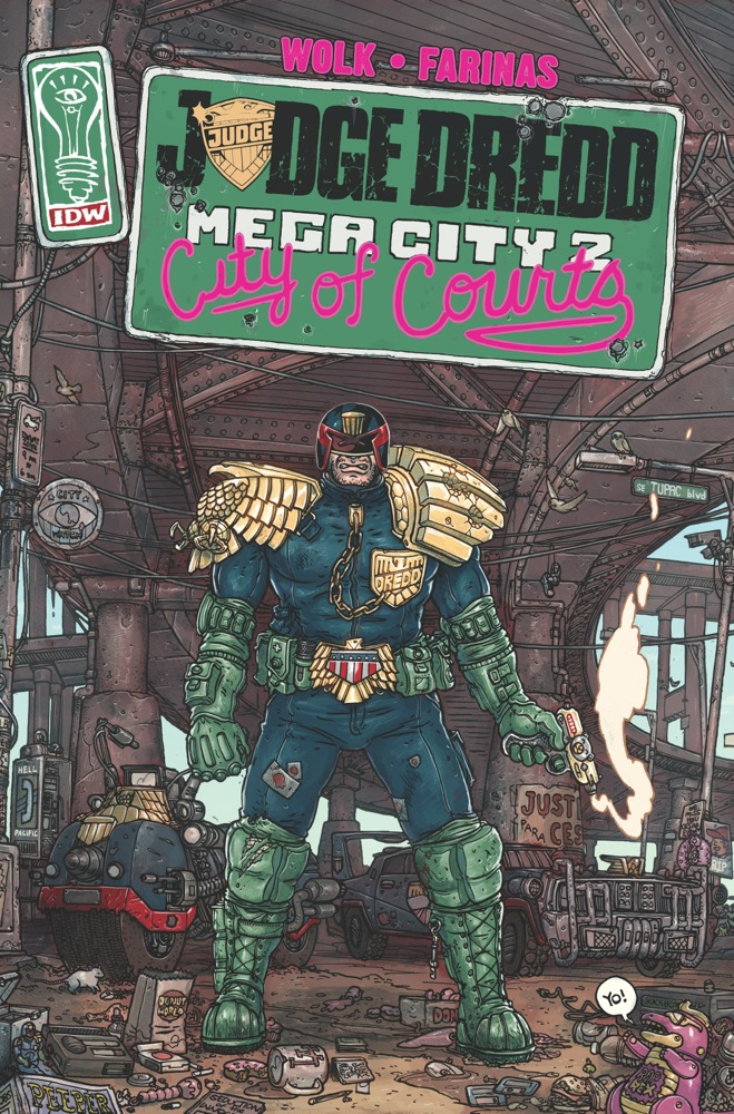 Dredd takes in the sun and the sand with a gun in hand.